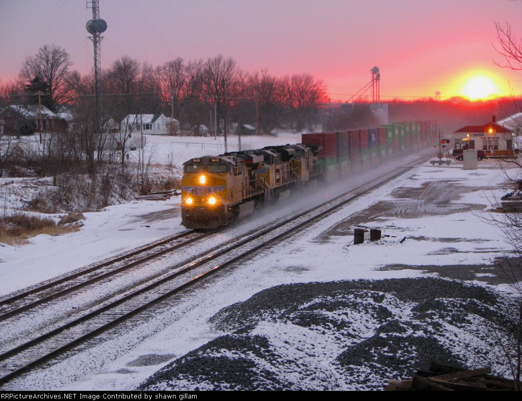 UP 7603 heads east with stacks at la plata on a zero degree day,